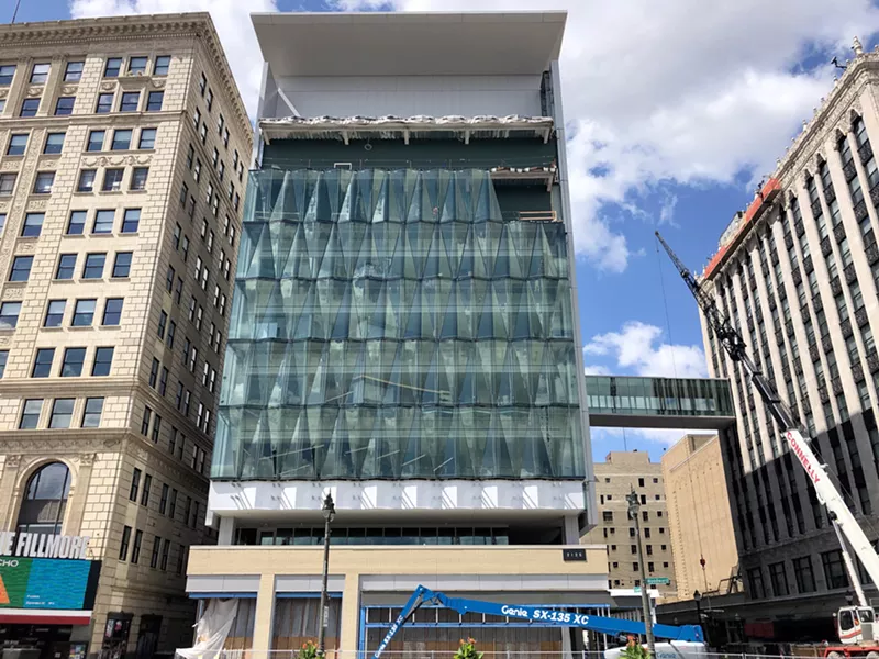 Pizza-shaped windows are finally nearing completion at Little Caesars ...