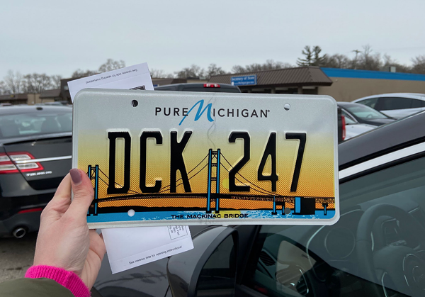 WOOD-TV reporter coincidentally gets 'DCK 247' license plate